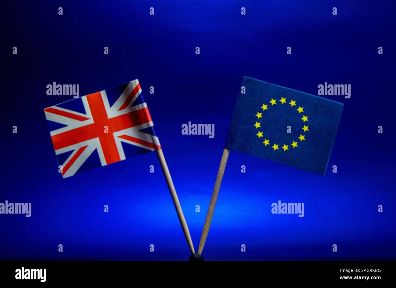 The British and EU flags stand together, against a sky blue background ...