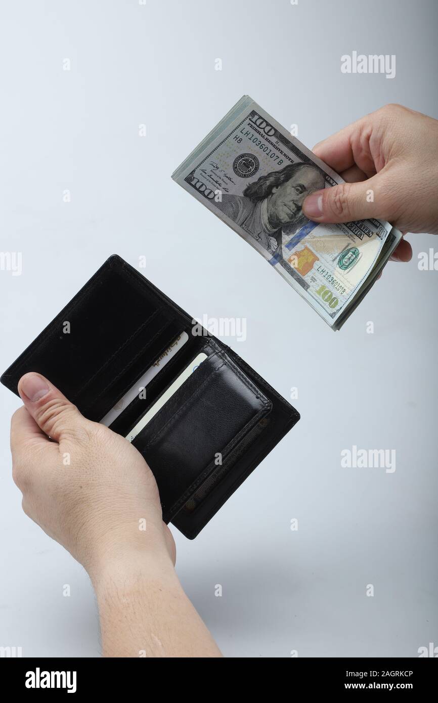 Man carrying bag money hi-res stock photography and images - Alamy
