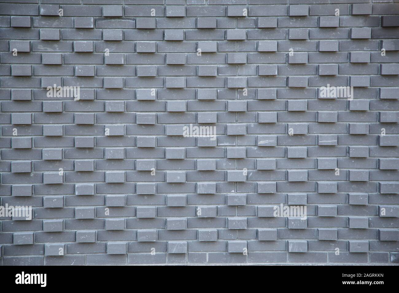 Seamless texture grey bricks wall fence Stock Photo - Alamy