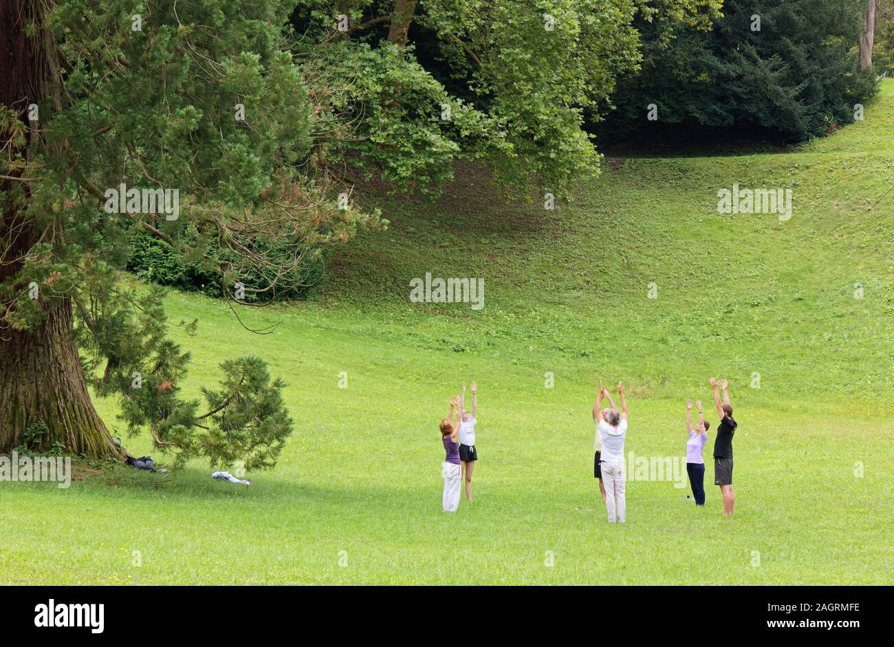 RIMSKE TOPLICE, Slovenia - August 3, 2019: A group of people exercising ...