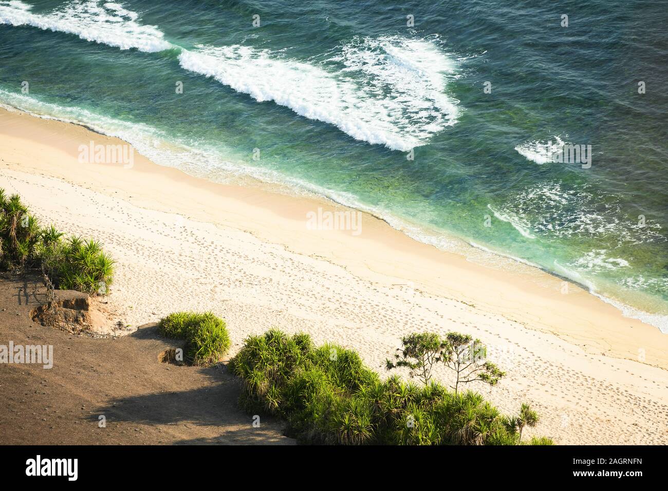 View from above, stunning aerial view of a beautiful wild beach bathed ...