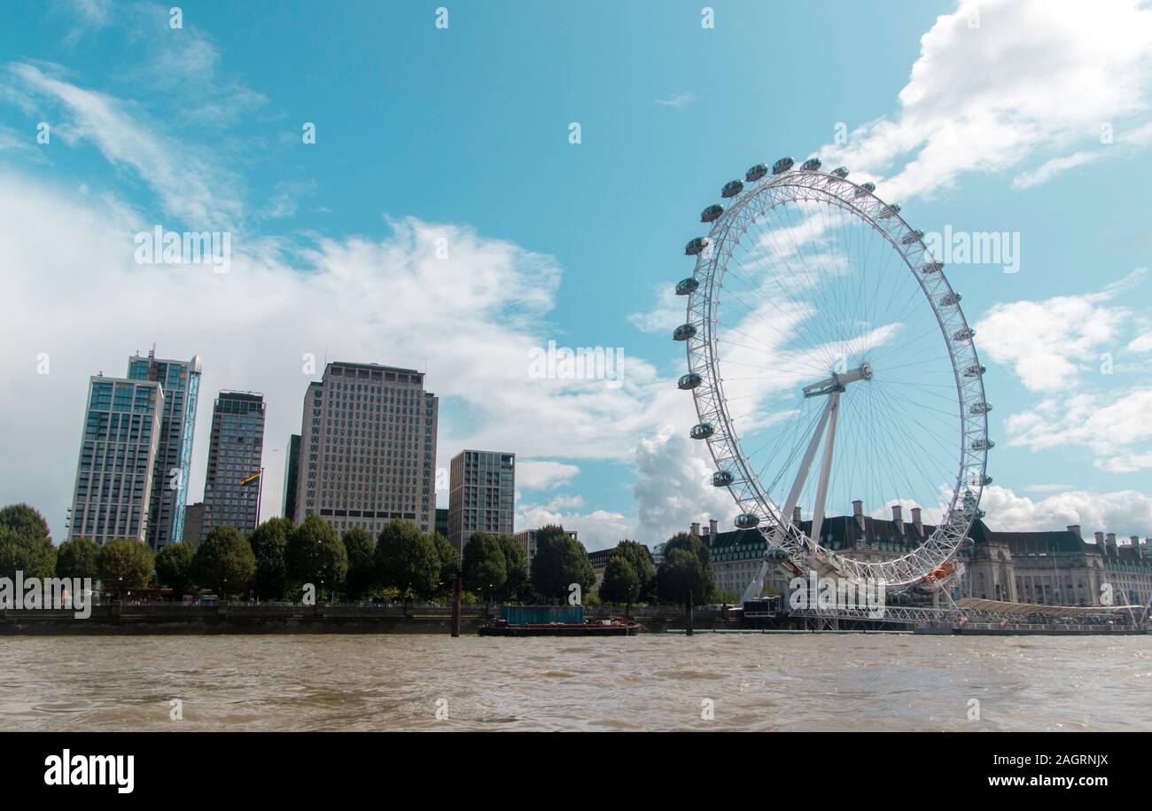 August 19, 2019 – River Thames, London, United Kingdom. The London Eye ...
