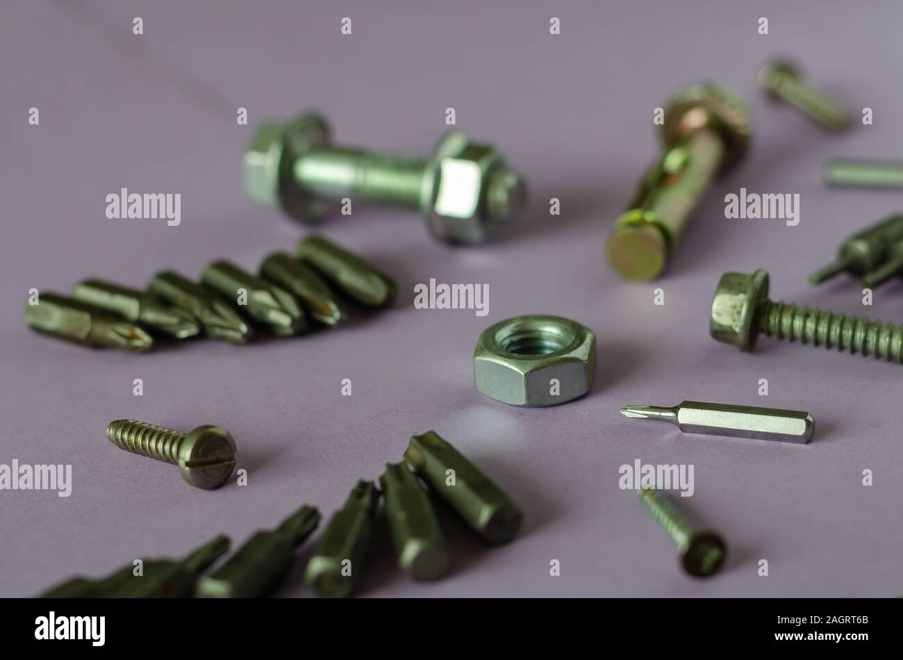 Industrial subject background. Nut, bolt, screw, bits for screwdriver ...