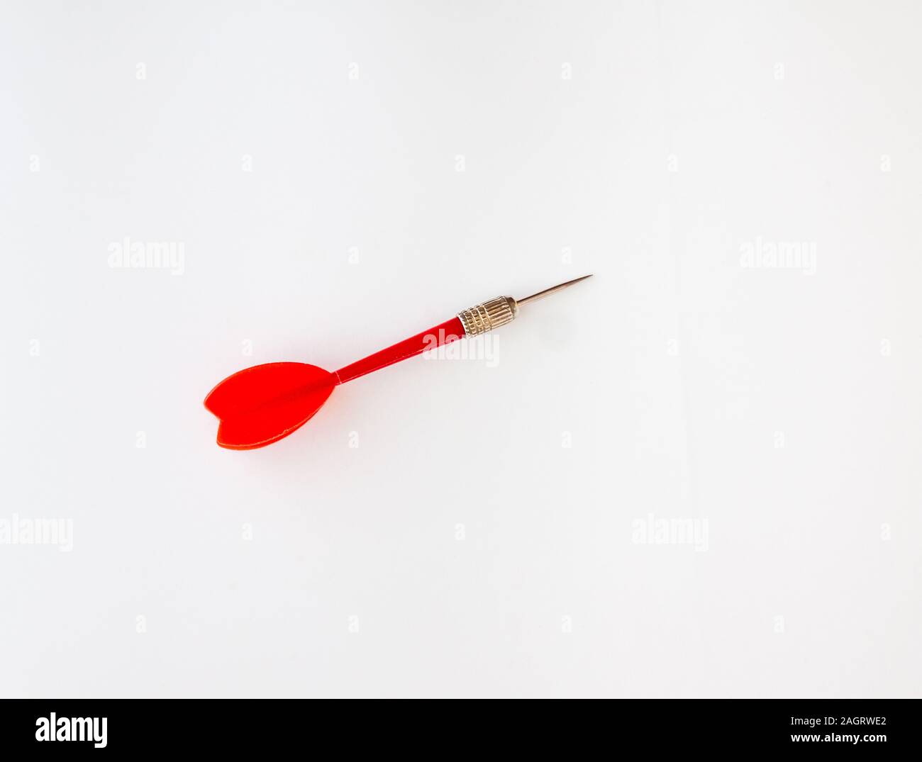 red dart for darts isolated on white background Stock Photo - Alamy