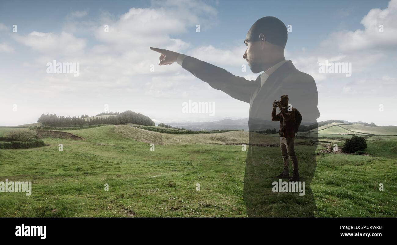 Pointing on. Businessman with landscapes on background, double exposure ...