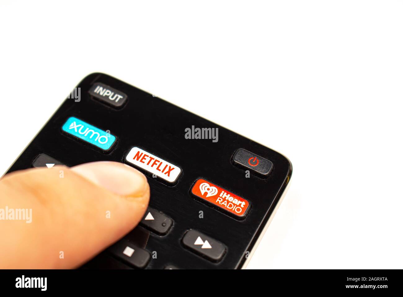 Calgary, Alberta. Canada Dec 20 2019. A person hand using a remote ...