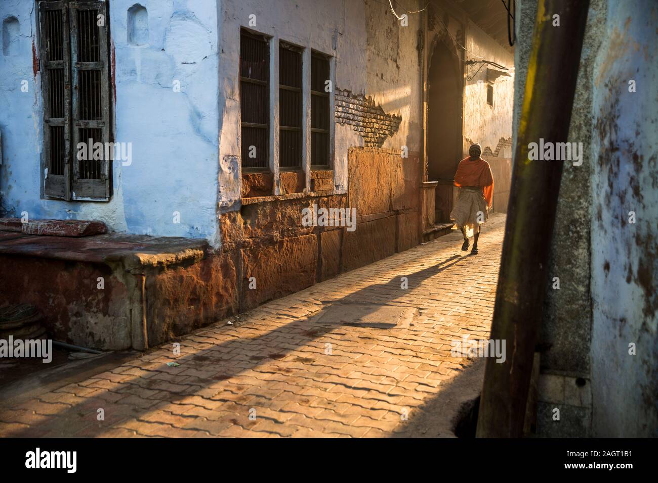 Man walking down a Vrindavan alley. India Stock Photo - Alamy