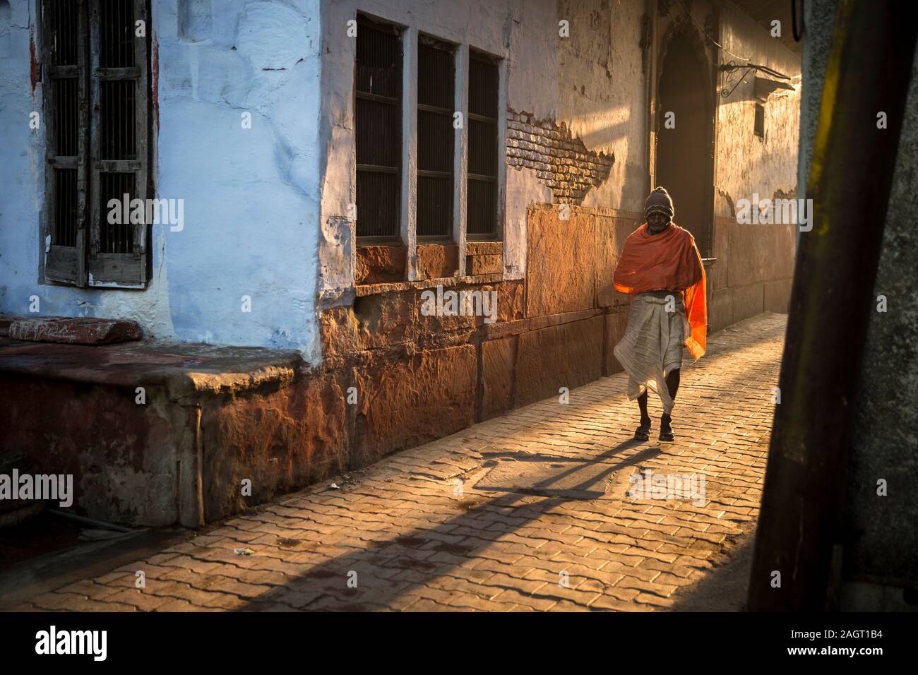 Man walking down a Vrindavan alley. India Stock Photo - Alamy
