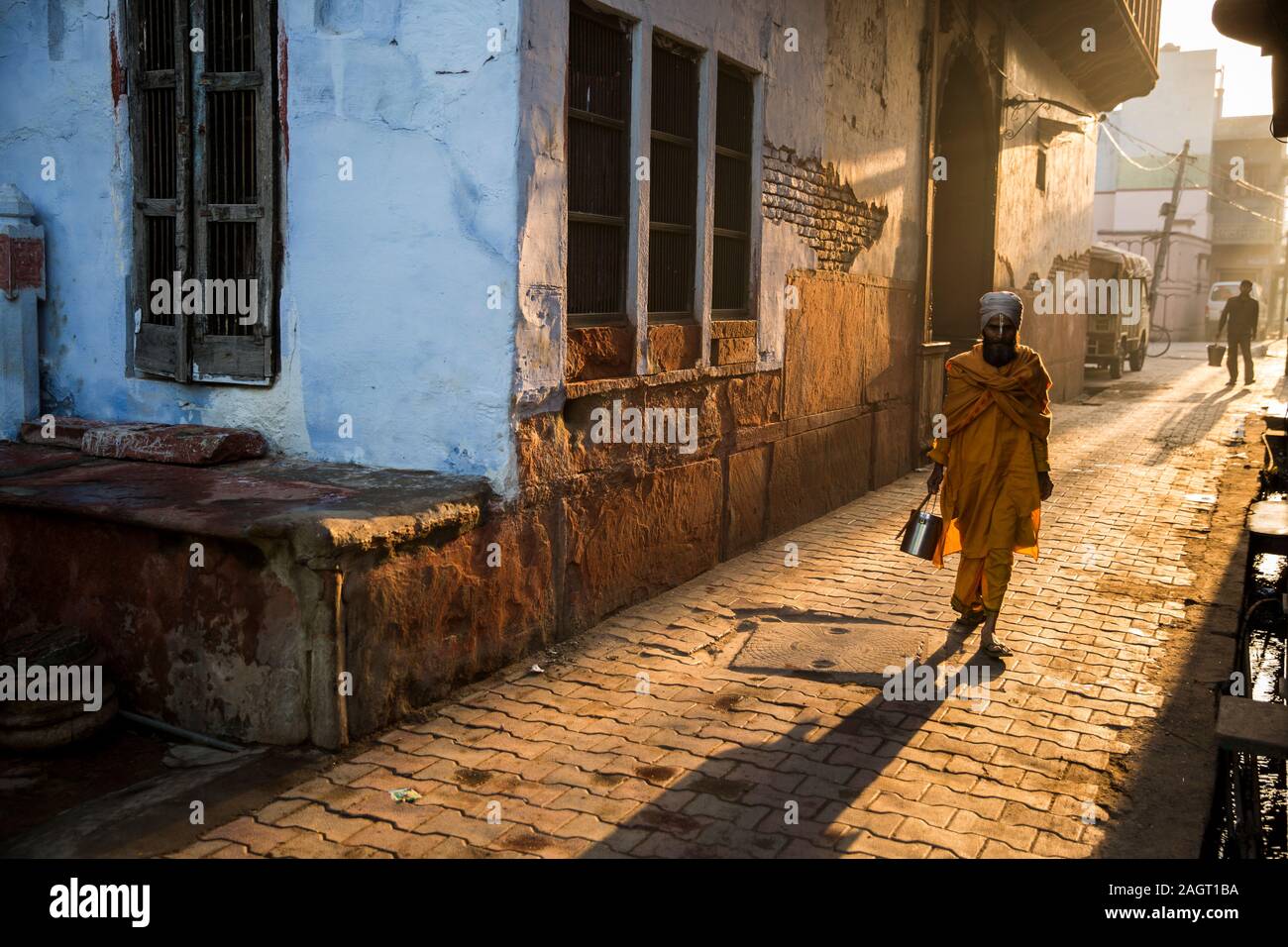 Saddhu walking down a Vrindavan alley. India Stock Photo - Alamy