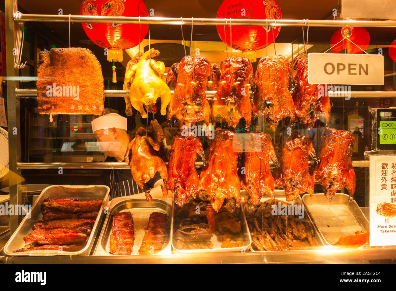 Peking Ducks hanging in window in Chinatown, Soho, London, UK Stock ...
