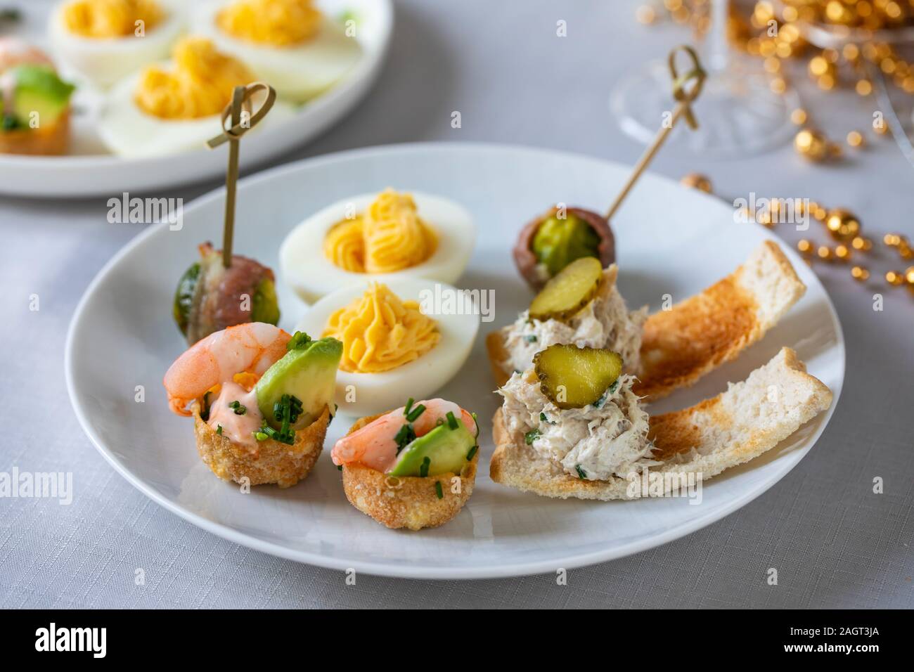 selection of festive canapes, devilled egg , mini prawn coctail ...