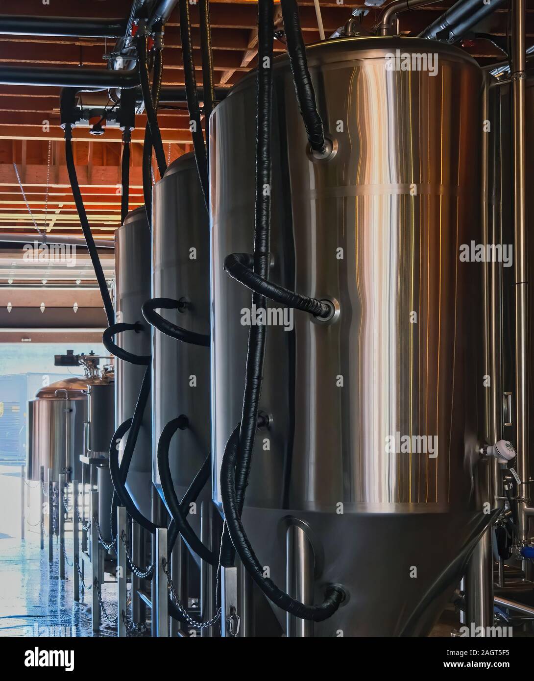 Stainless Steel Beer Tanks in Brewery Stock Photo - Alamy