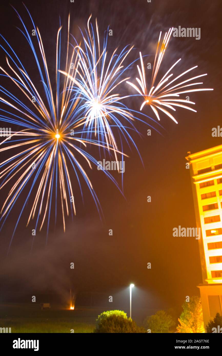 Fireworks Display Next to Building Stock Photo - Alamy