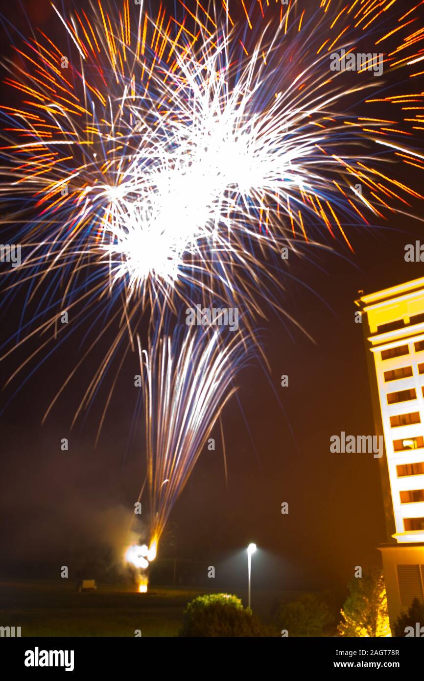 Fireworks Display Next to Building Stock Photo - Alamy