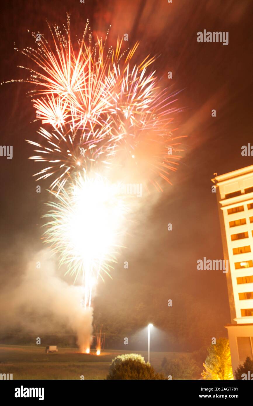 Fireworks Display Next to Building Stock Photo - Alamy
