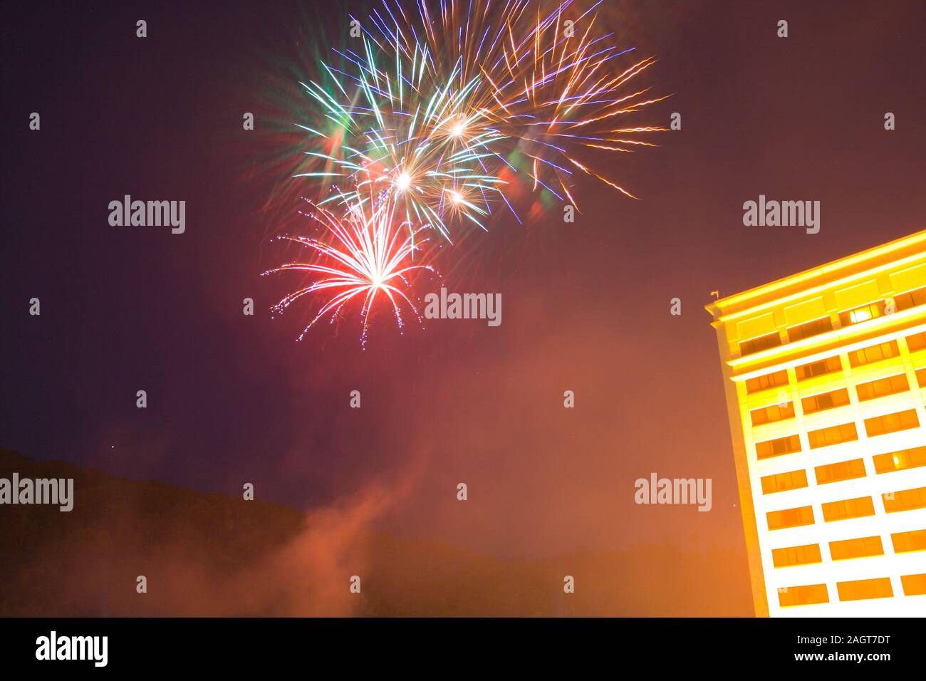 Fireworks Display Next to Building Stock Photo - Alamy