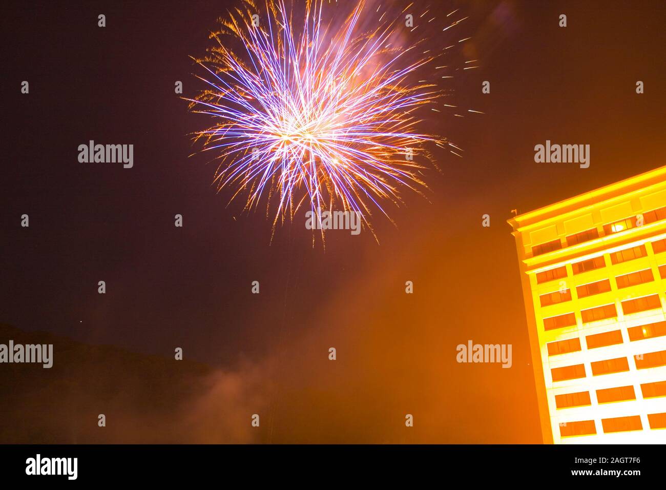 Fireworks Display Next to Building Stock Photo - Alamy