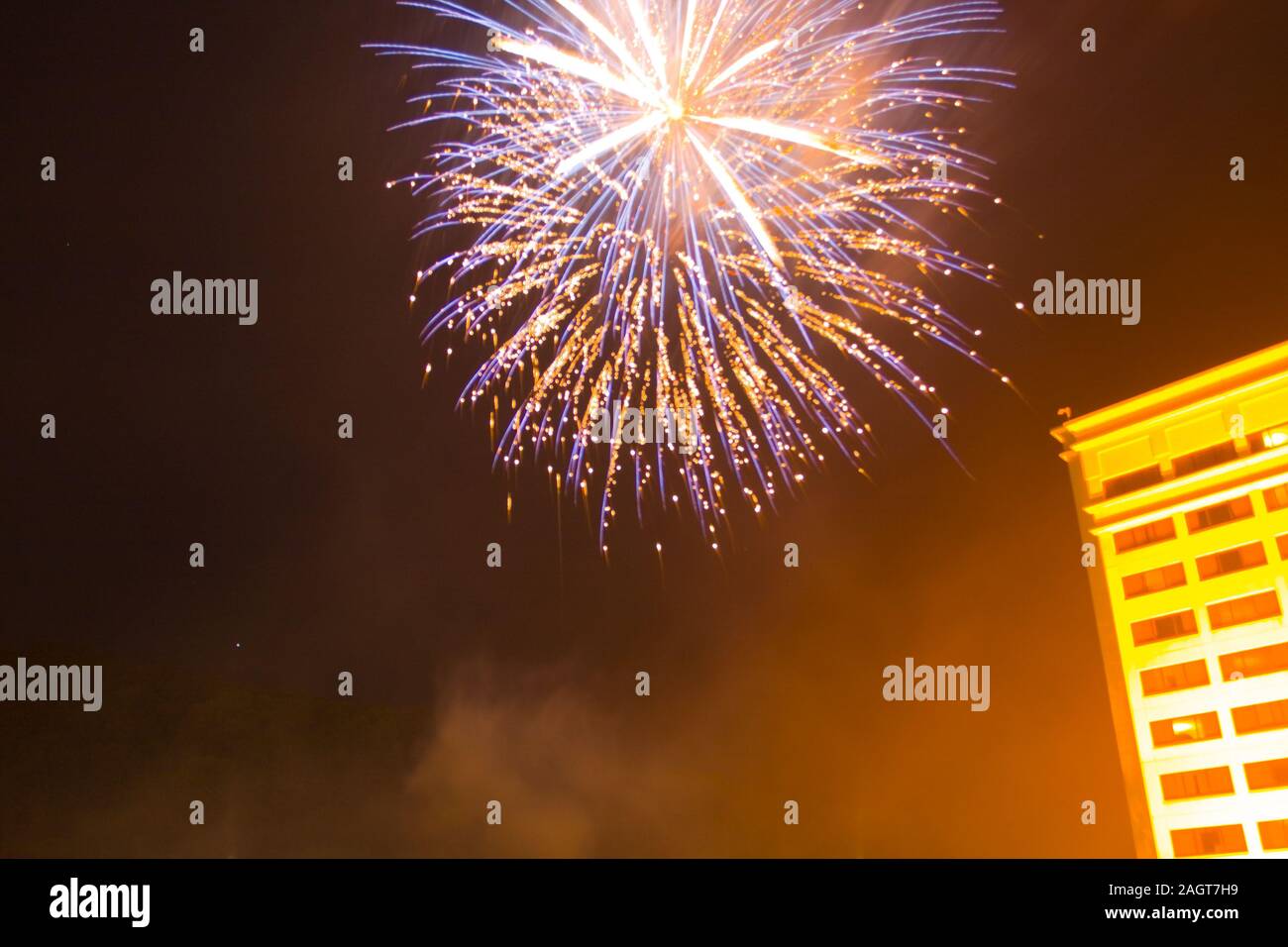 Fireworks Display Next to Building Stock Photo - Alamy