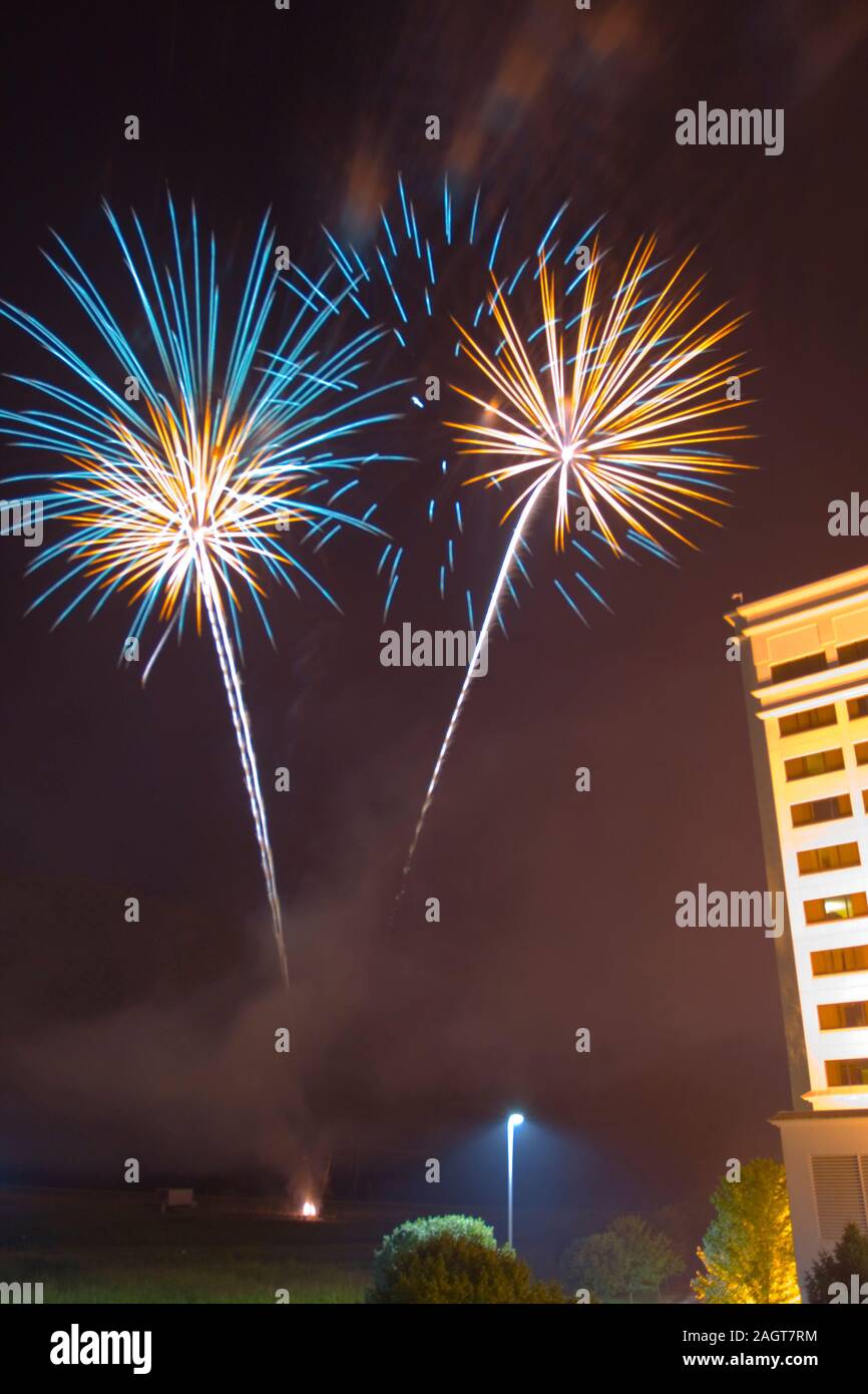 Fireworks Display Next to Building Stock Photo - Alamy
