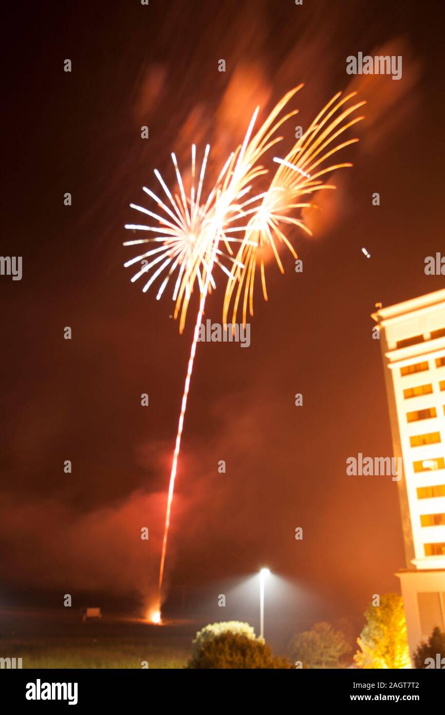 Fireworks Display Next to Building Stock Photo - Alamy