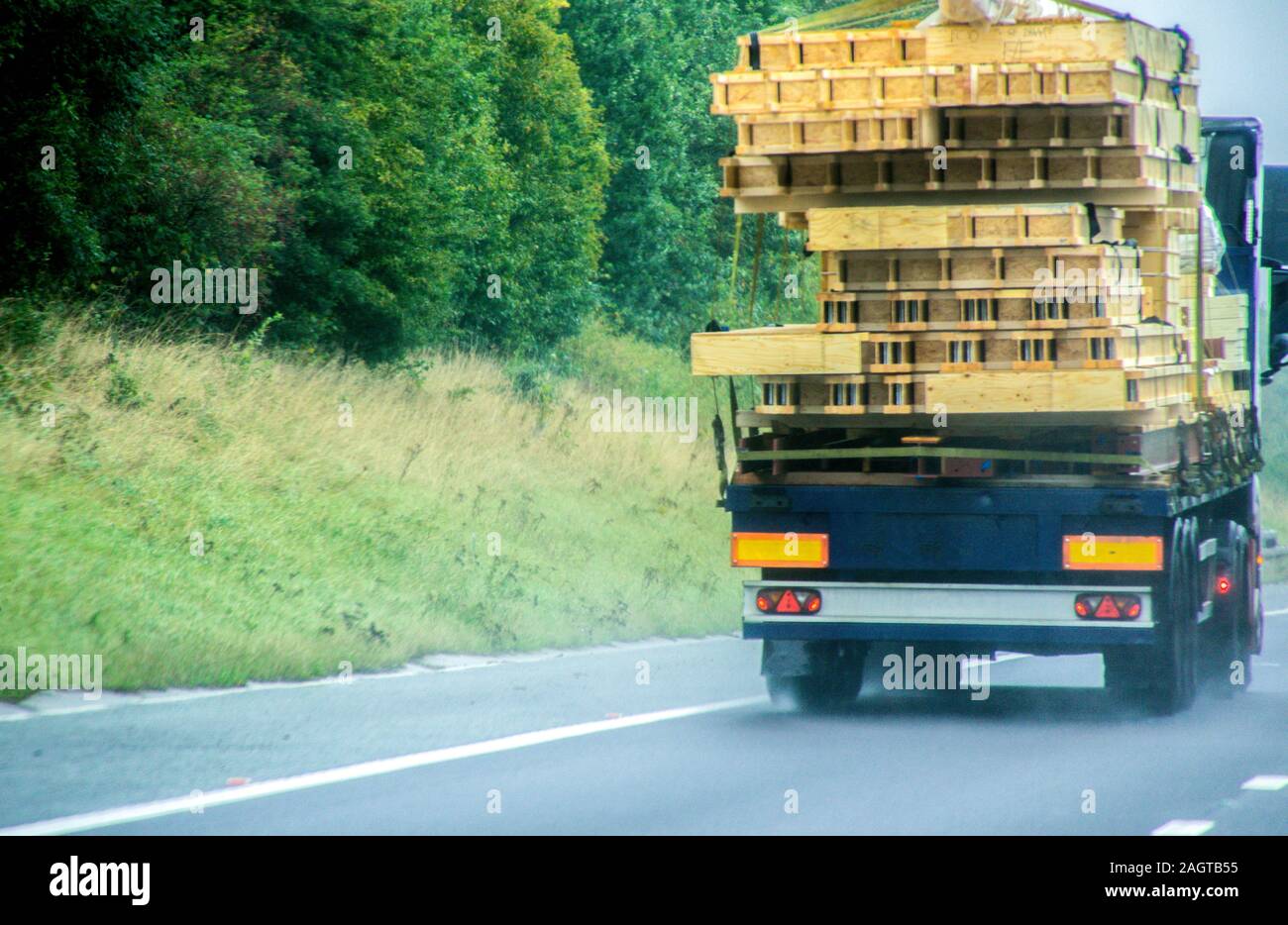 An articulated lorry carrying timber most likely for a new build ...