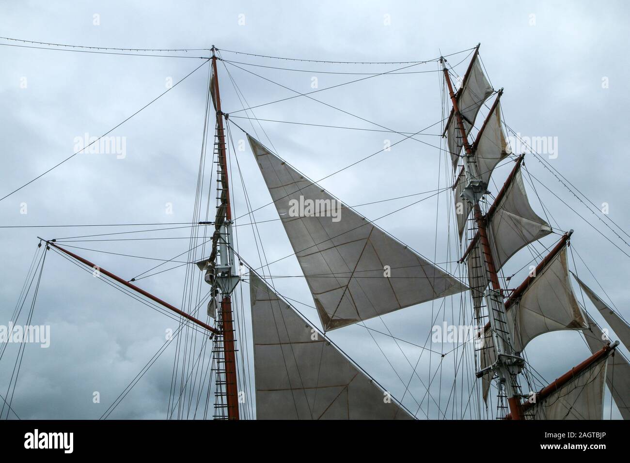 The detail of the masts and sails of the big old historic sailboat ...