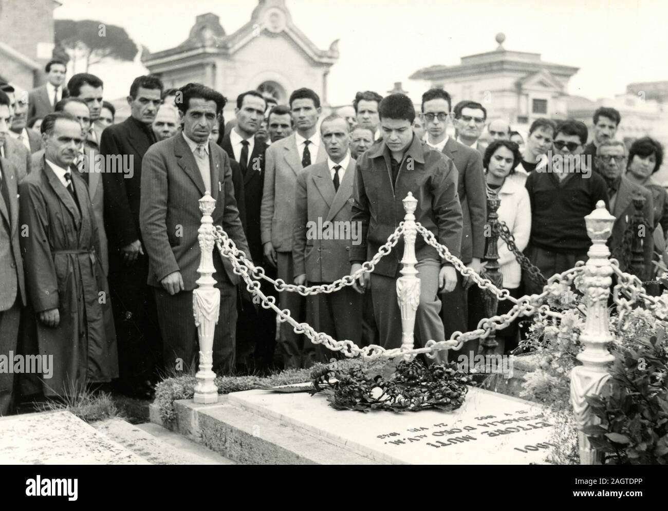 People paying homage to the tomb of Italian Army officer, aviator, and ...