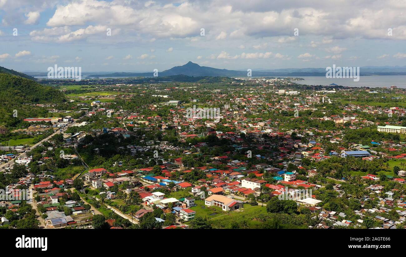 Tropical landscape with panorama of Tacloban, aerial view. Town and sky ...