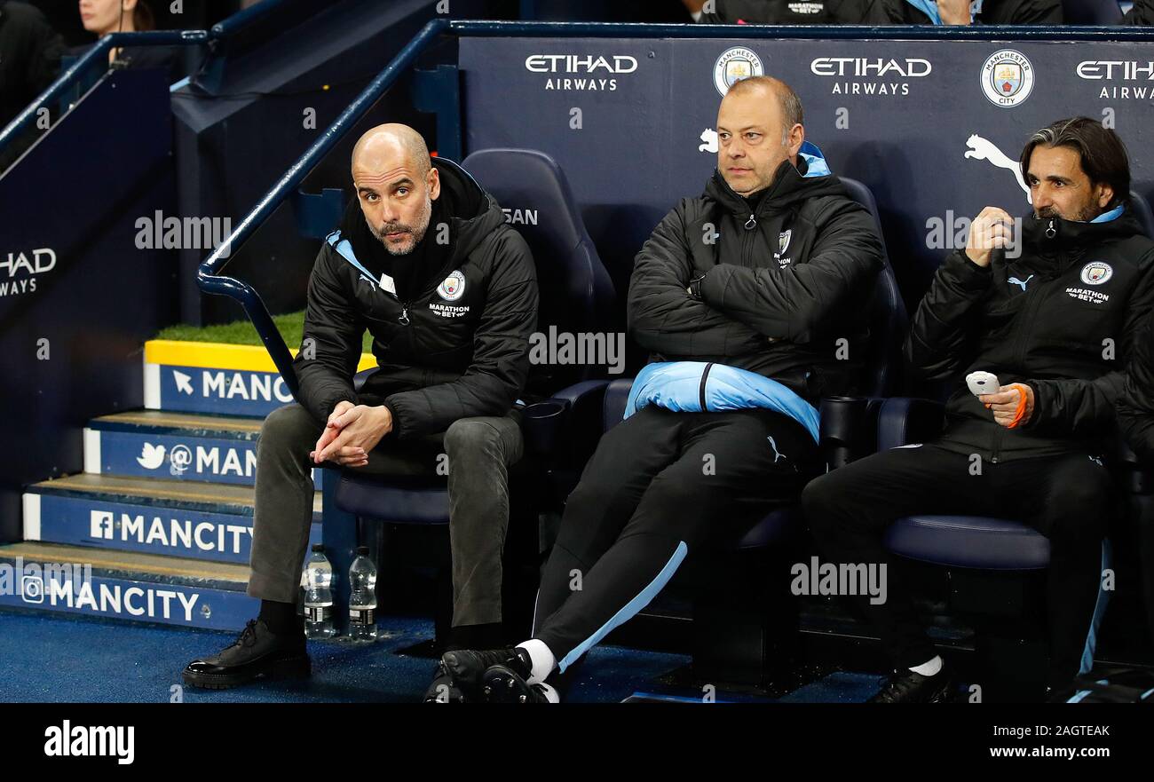 Manchester City manager Pep Guardiola (left) with assistant Rodolfo ...