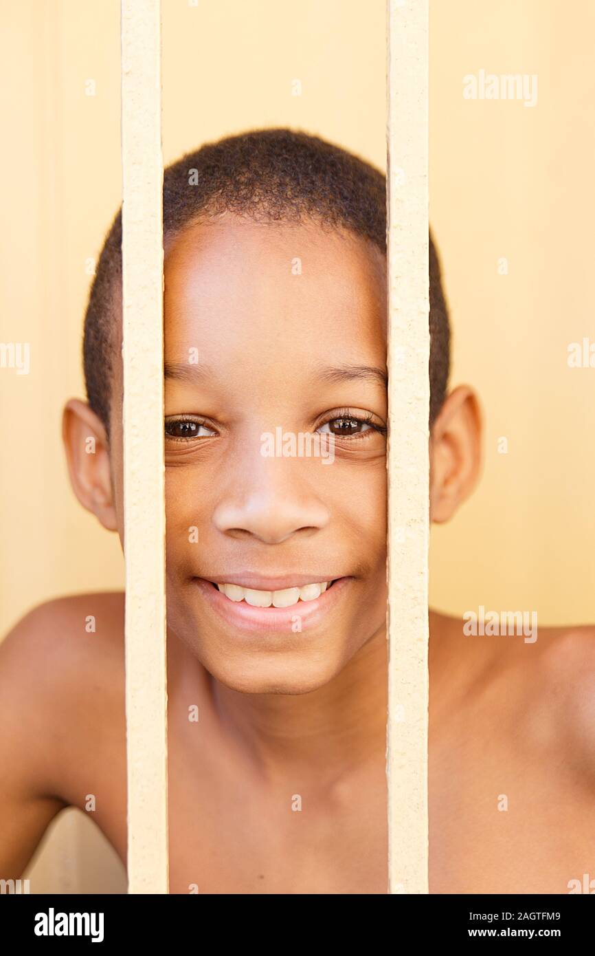 Children playing behind a fence hi-res stock photography and images - Alamy