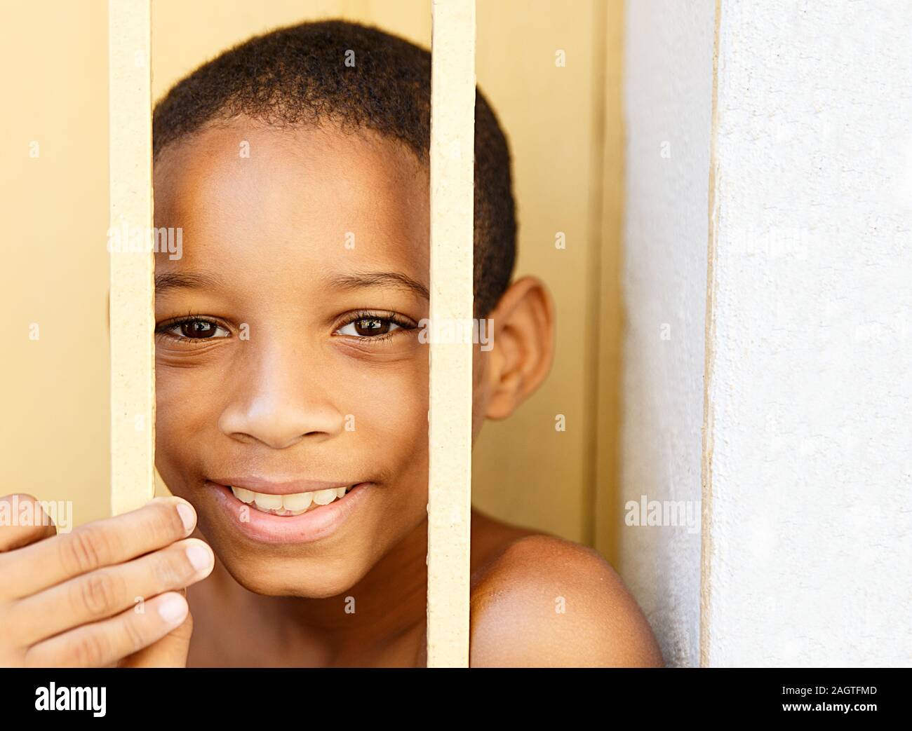 Children playing behind a fence hi-res stock photography and images - Alamy
