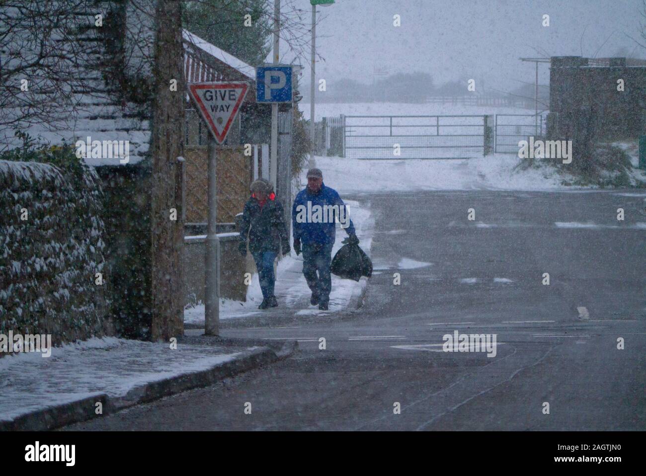 A couple brave heavy snow in Dornoch Sutherland Scotland UK Stock Photo ...