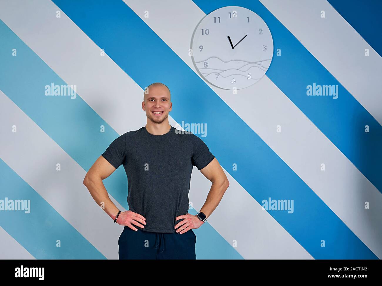 coach stands at the clock Stock Photo - Alamy