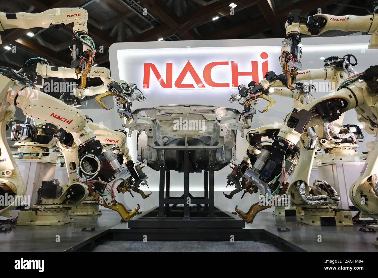 Tokyo, Japan. 21st Dec, 2019. The NACHI line up arm robots perform ...