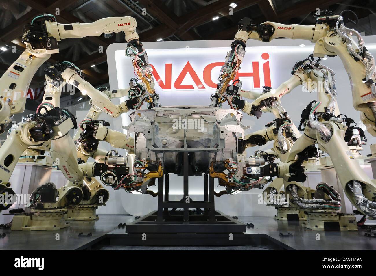 Tokyo, Japan. 21st Dec, 2019. The NACHI line up arm robots perform ...