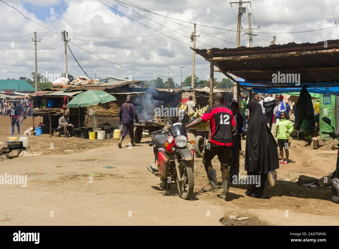 Local residents going about daily life, Mathare slum, Nairobi, Kenya ...