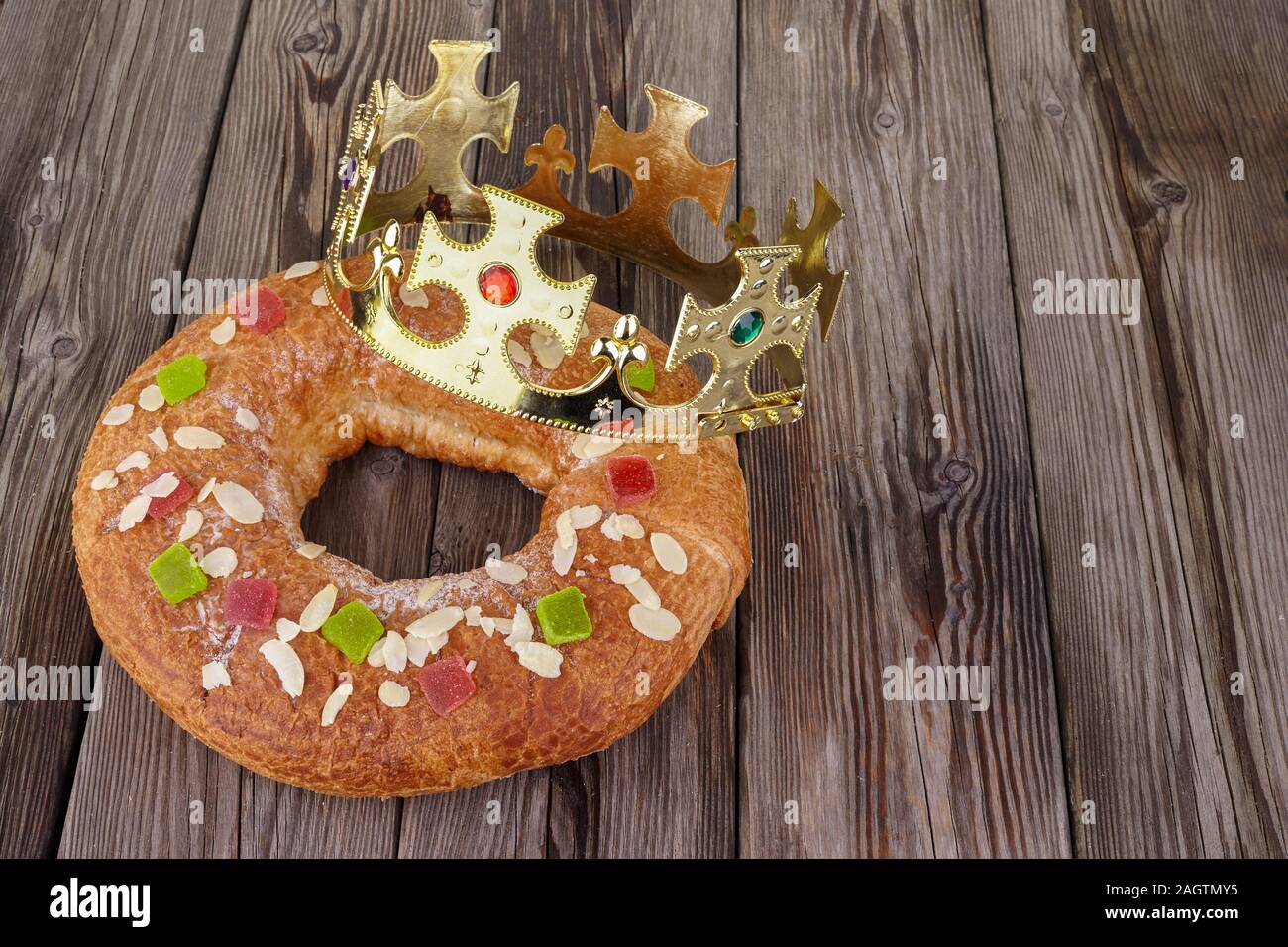 Epiphany cake, Kings cake, Roscon de reyes or Rosca de reyes on wooden ...