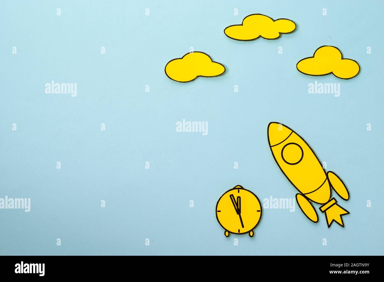 Little yellow rocket speeding through space blue sky background Stock ...