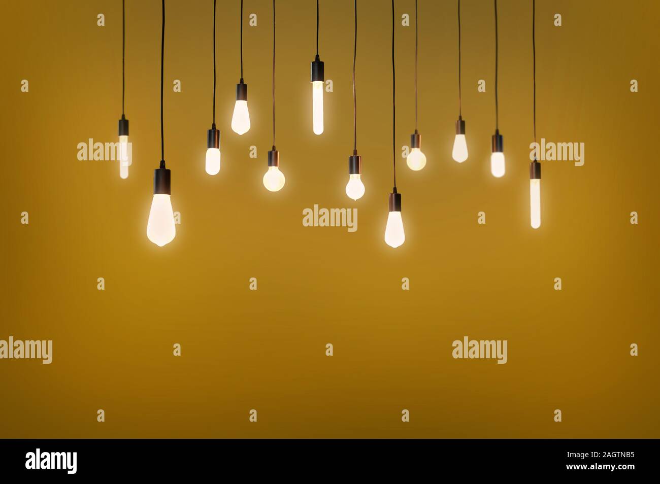 Lightbulb illuminated by candlelight hi-res stock photography and ...