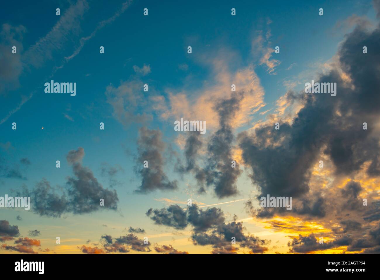 Colorful clouds at sunset. Sky background or texture at the sunset ...