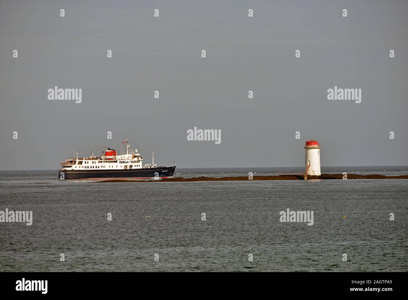 HEBRIDEAN PRINCESS passing the ANGUS ROCK TOWER at the mouth of ...