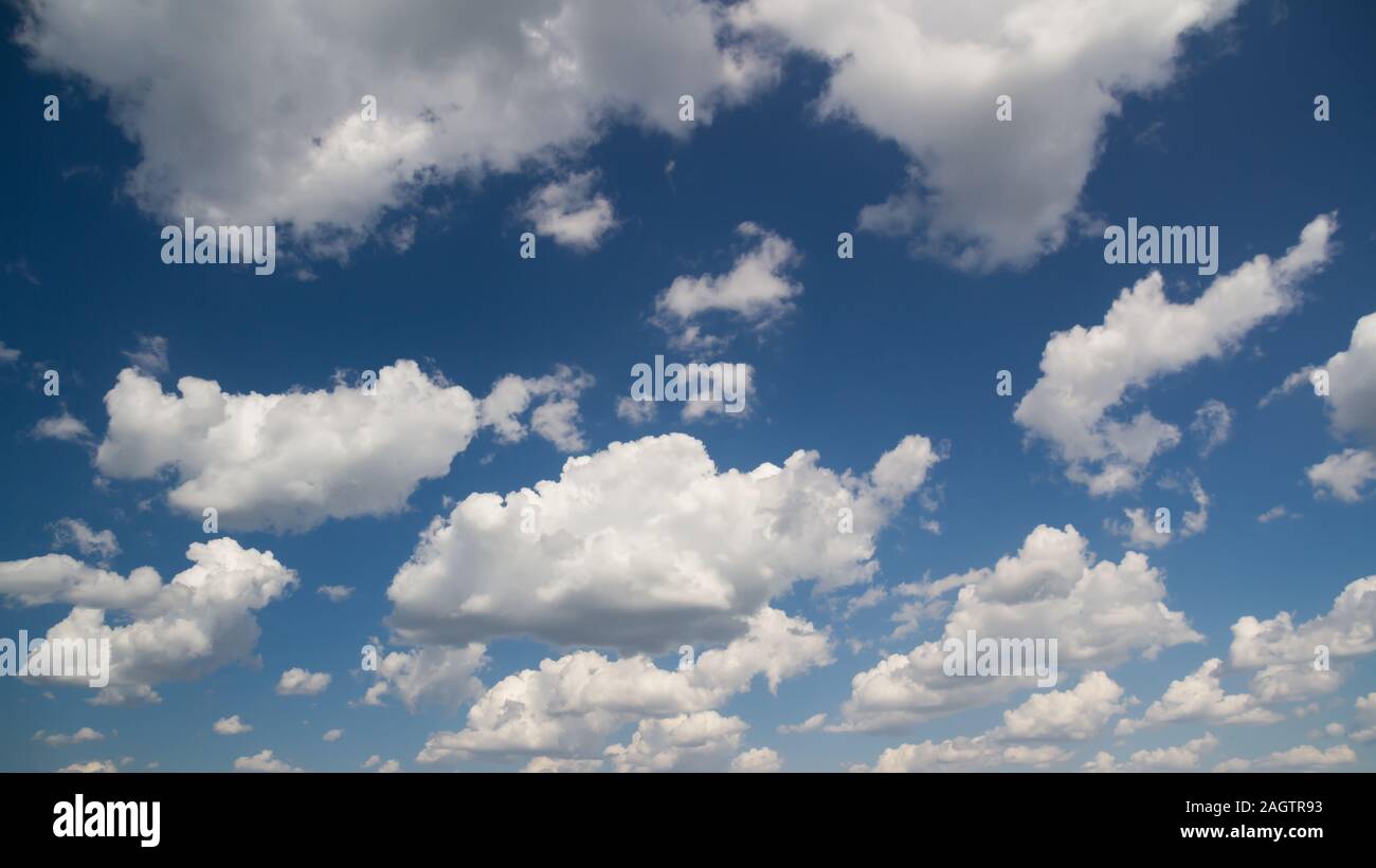 Blue sky with white clouds. Natural background image Stock Photo - Alamy