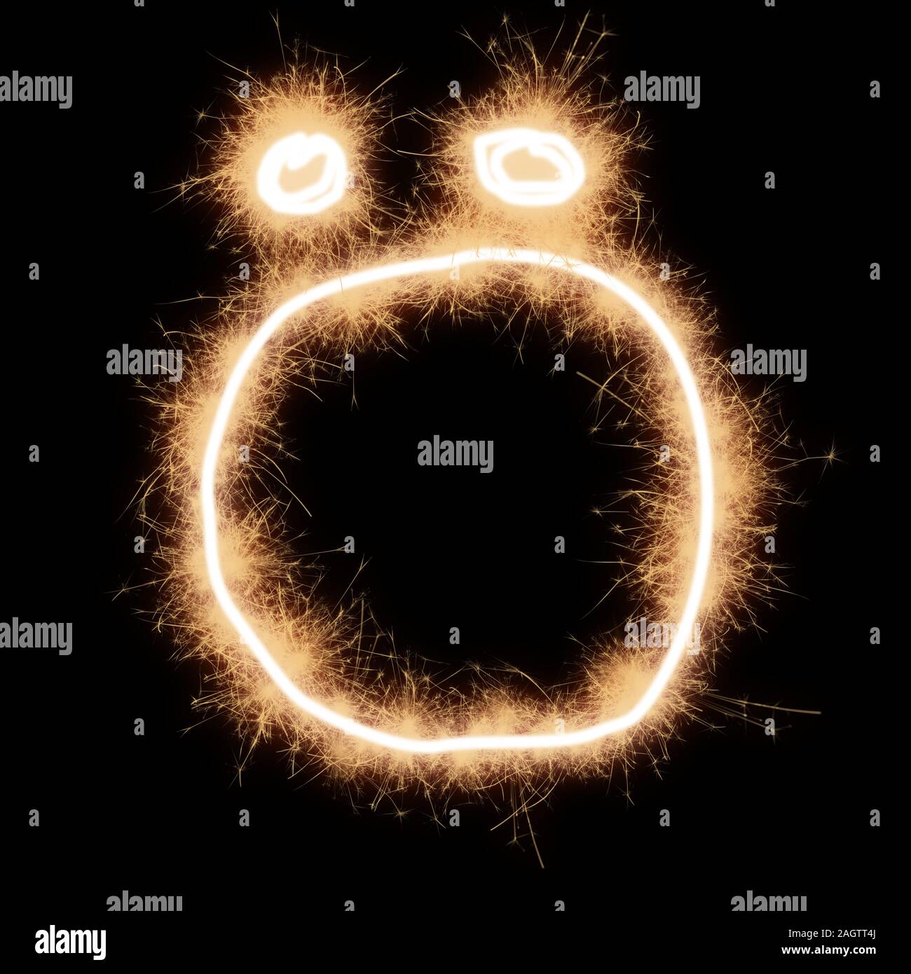 Lower case oe letter of alphabet written by squib sparks on a black ...