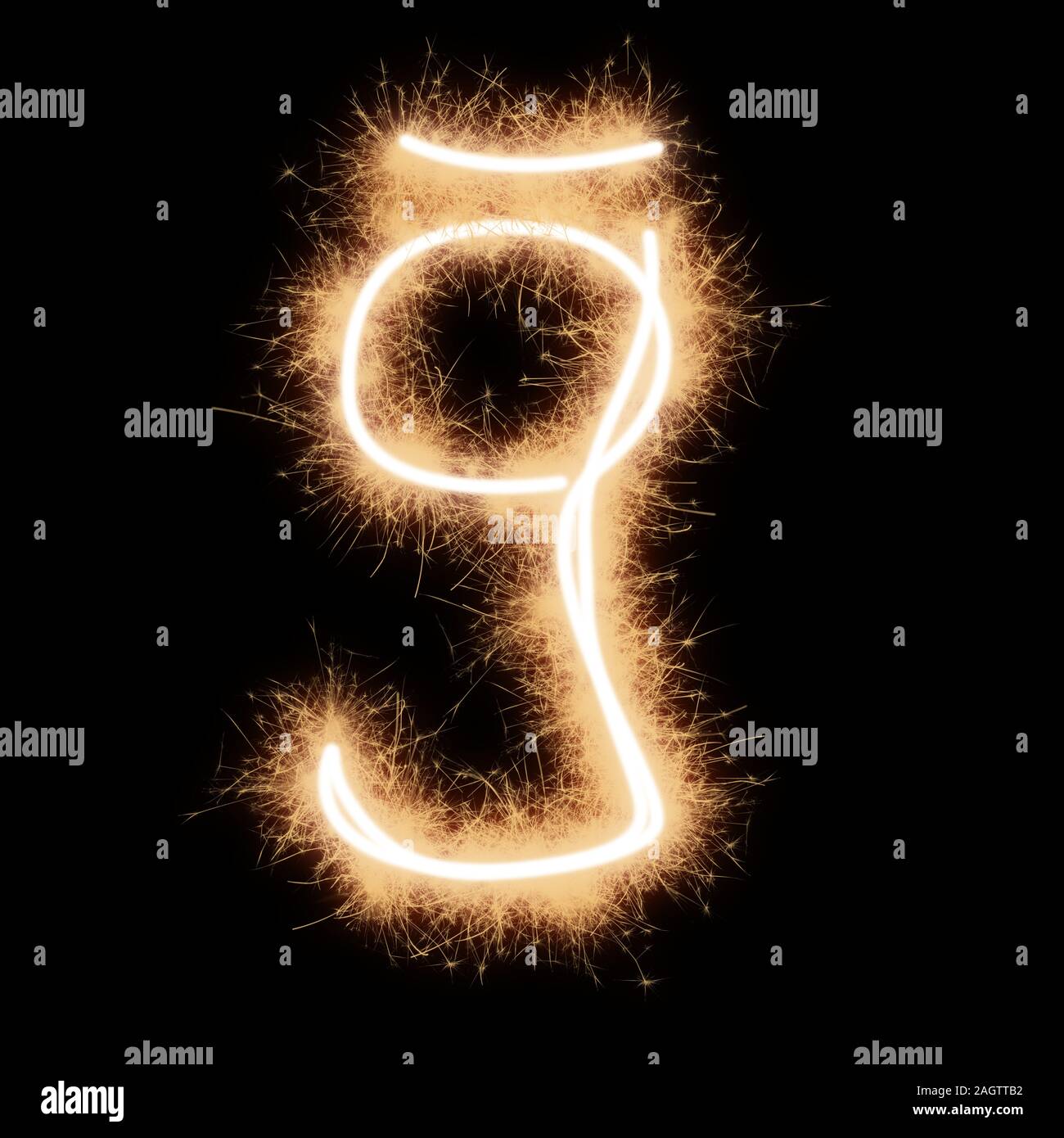 Lower case soft g letter of alphabet written by squib sparks on a black ...