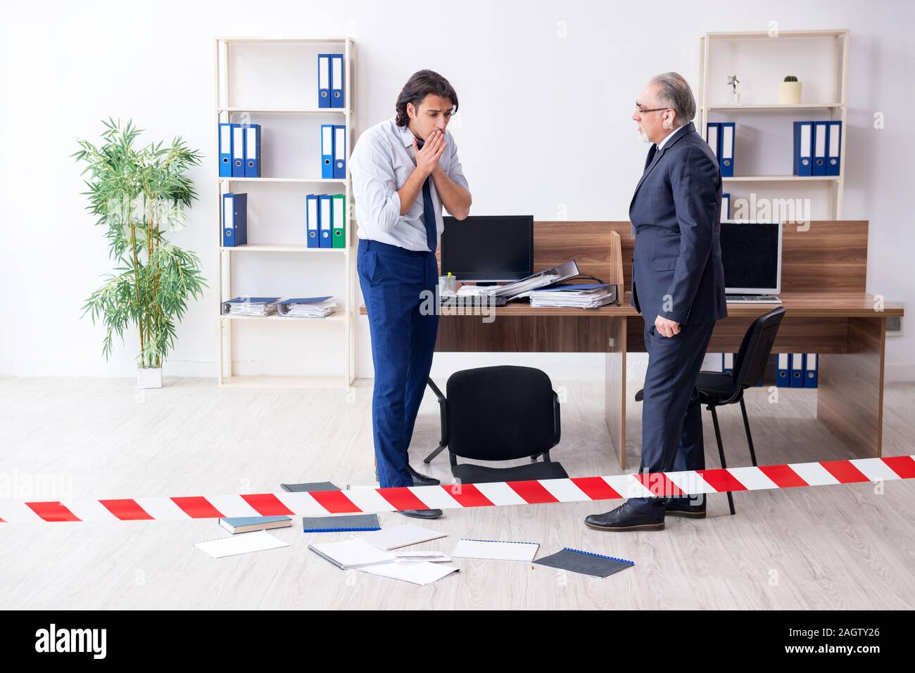 The forensic investigator investigating theft in the office Stock Photo ...
