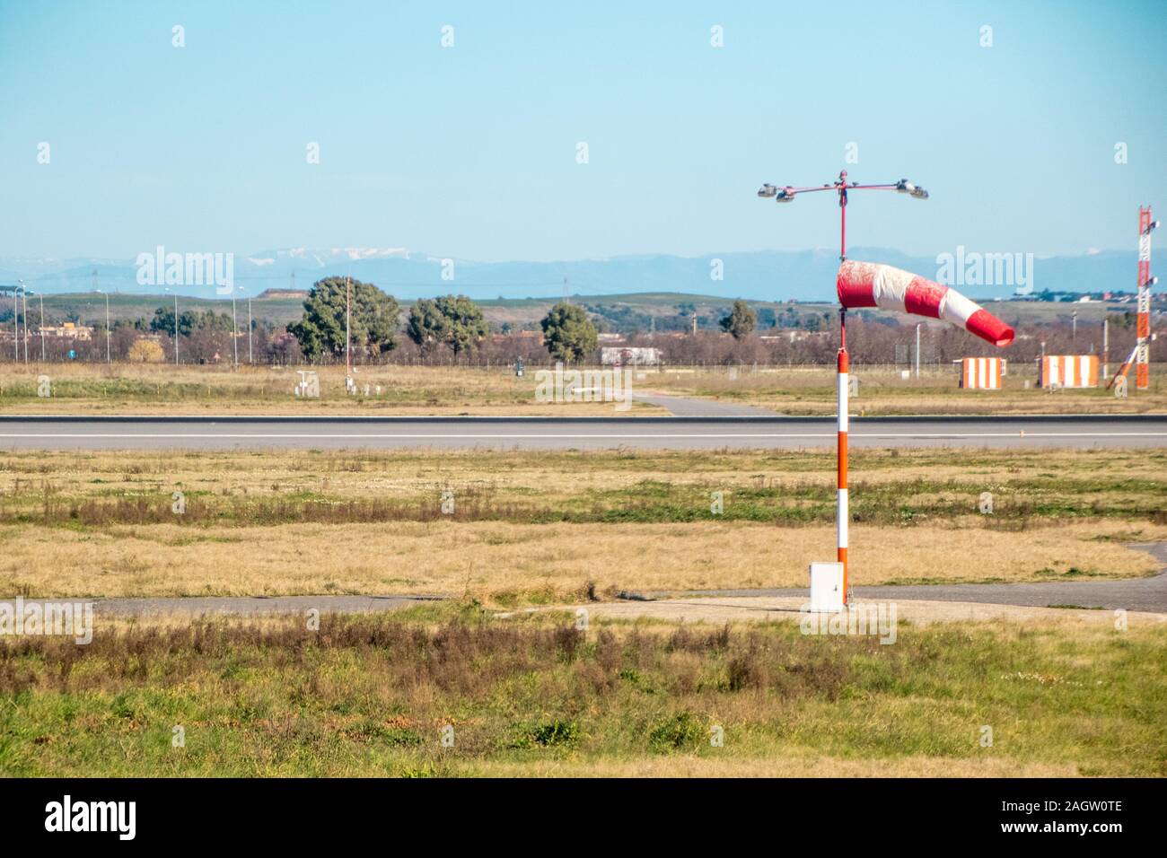 A view of an airport windsock. This gives pilots an indication of which ...