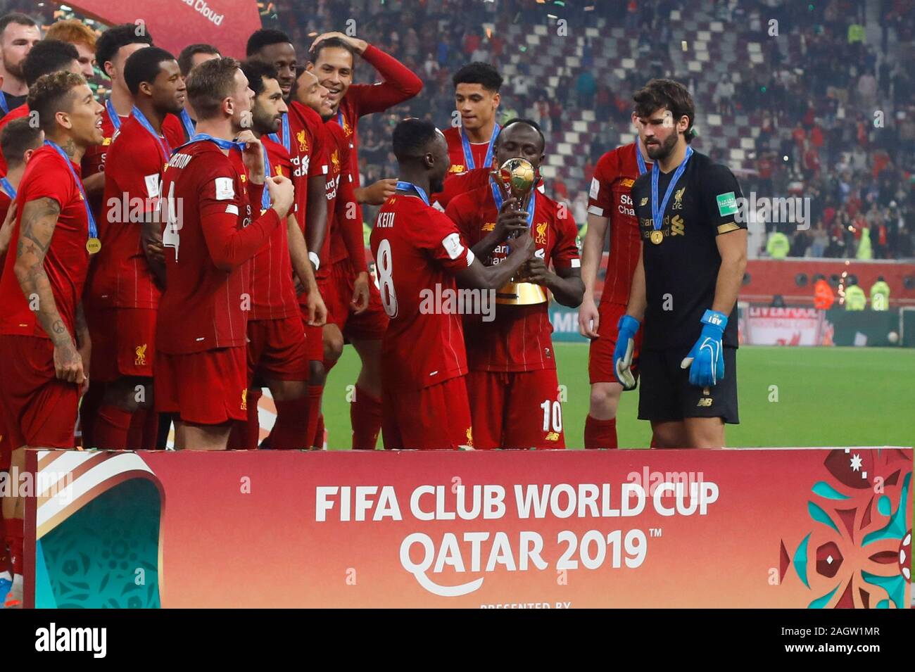 Doha, Qatar. 21st Dec, 2019. Liverpool receive the winner trophy after ...