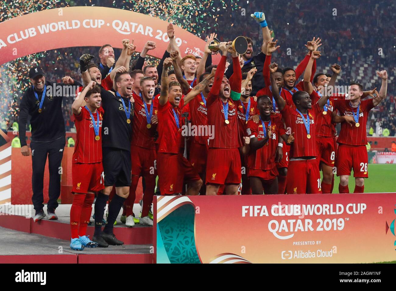 Doha, Qatar. 21st Dec, 2019. Liverpool receive the winner trophy after ...