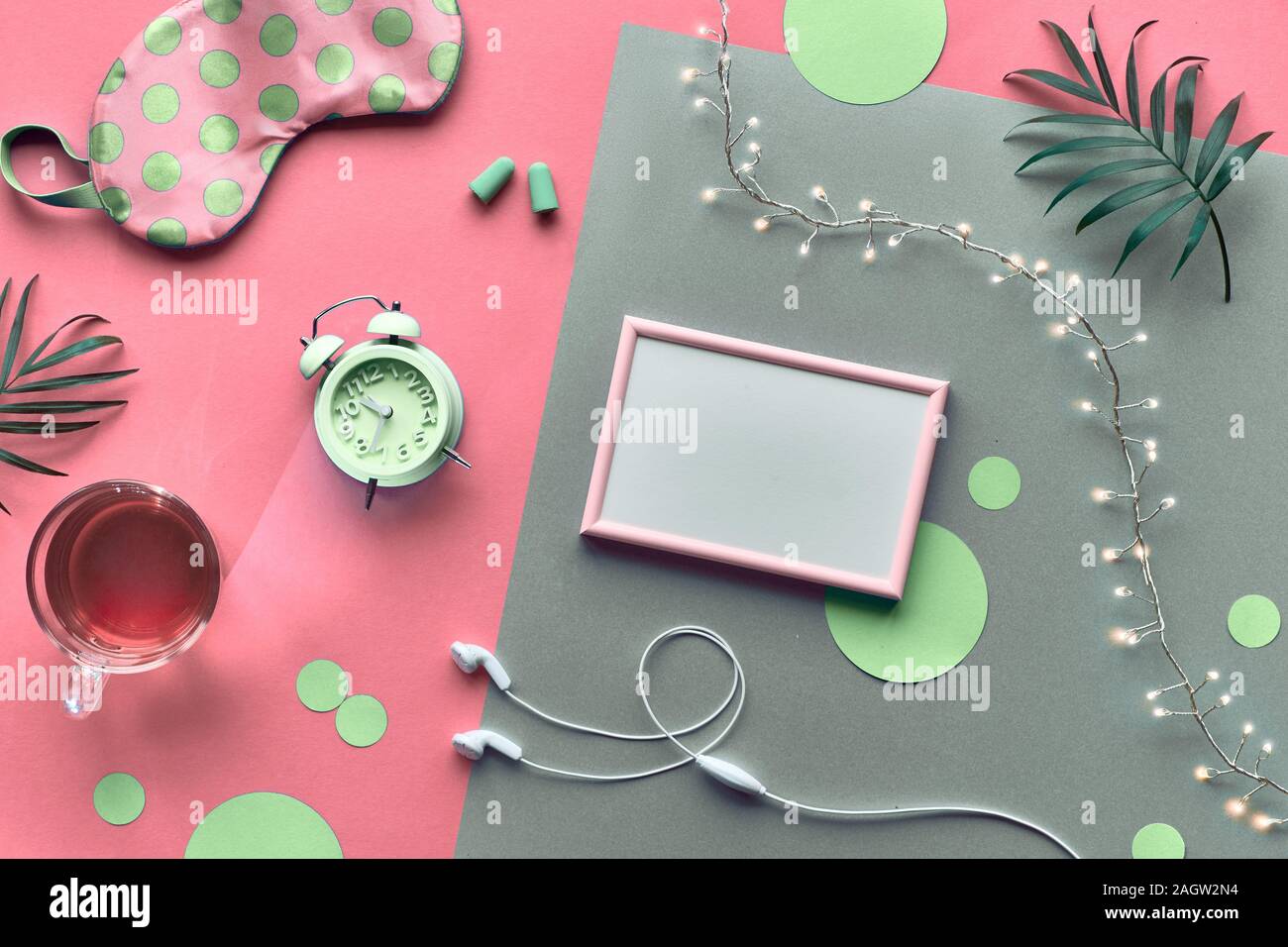 Healthy night sleep creative concept. Sleeping mask, green alarm clock ...