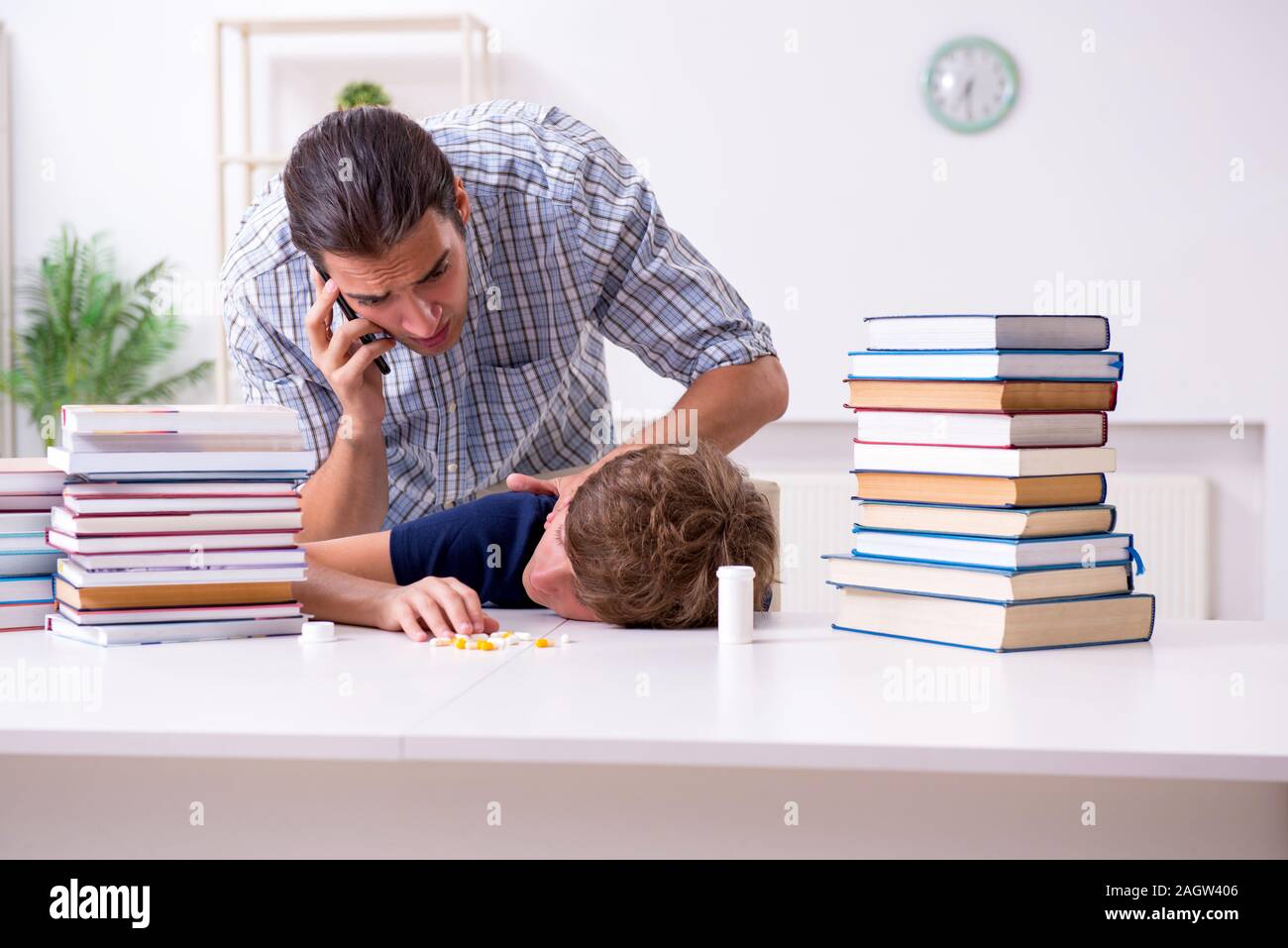 The young student stressed due to excessive studies Stock Photo - Alamy